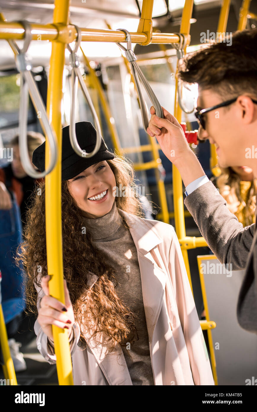 smiling couple in bus Stock Photo - Alamy