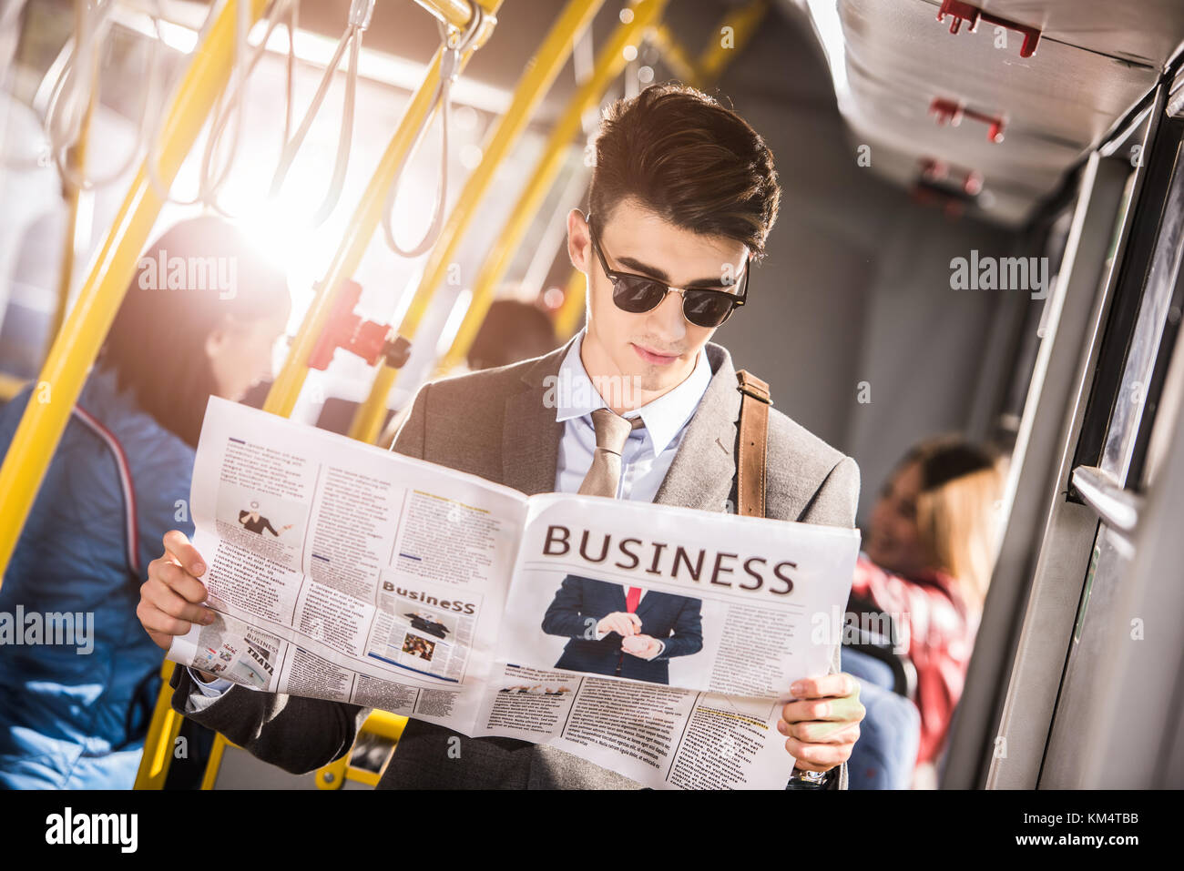 young businessman in bus Stock Photo - Alamy