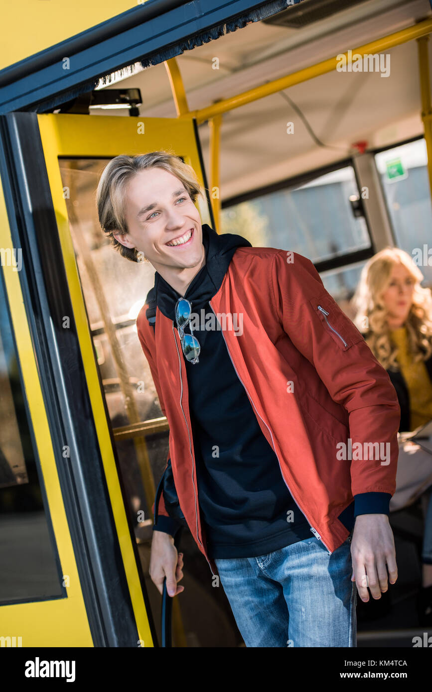 young man in bus Stock Photo - Alamy
