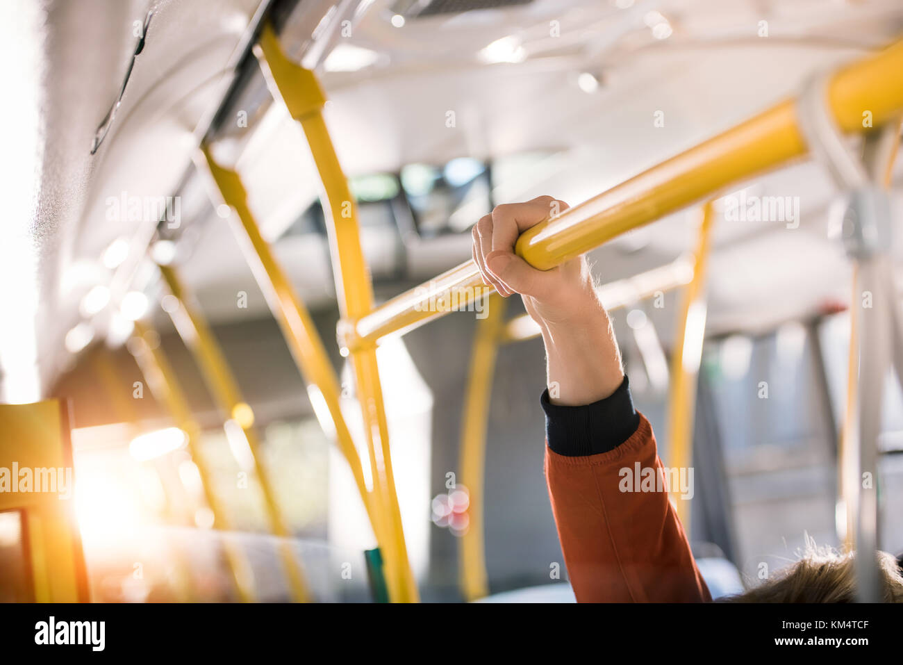 person standing in bus Stock Photo - Alamy