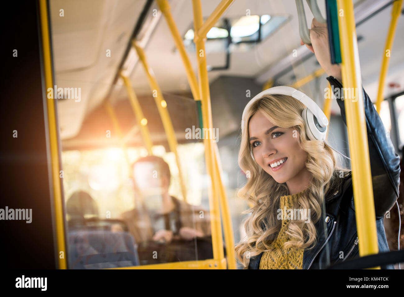 girl listening music in bus Stock Photo - Alamy