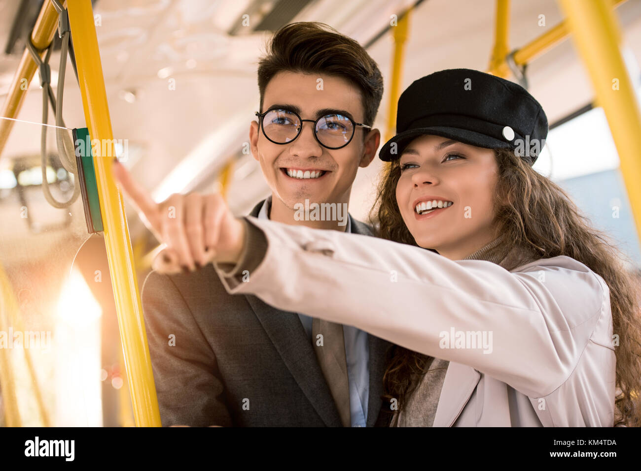 smiling couple in bus Stock Photo - Alamy