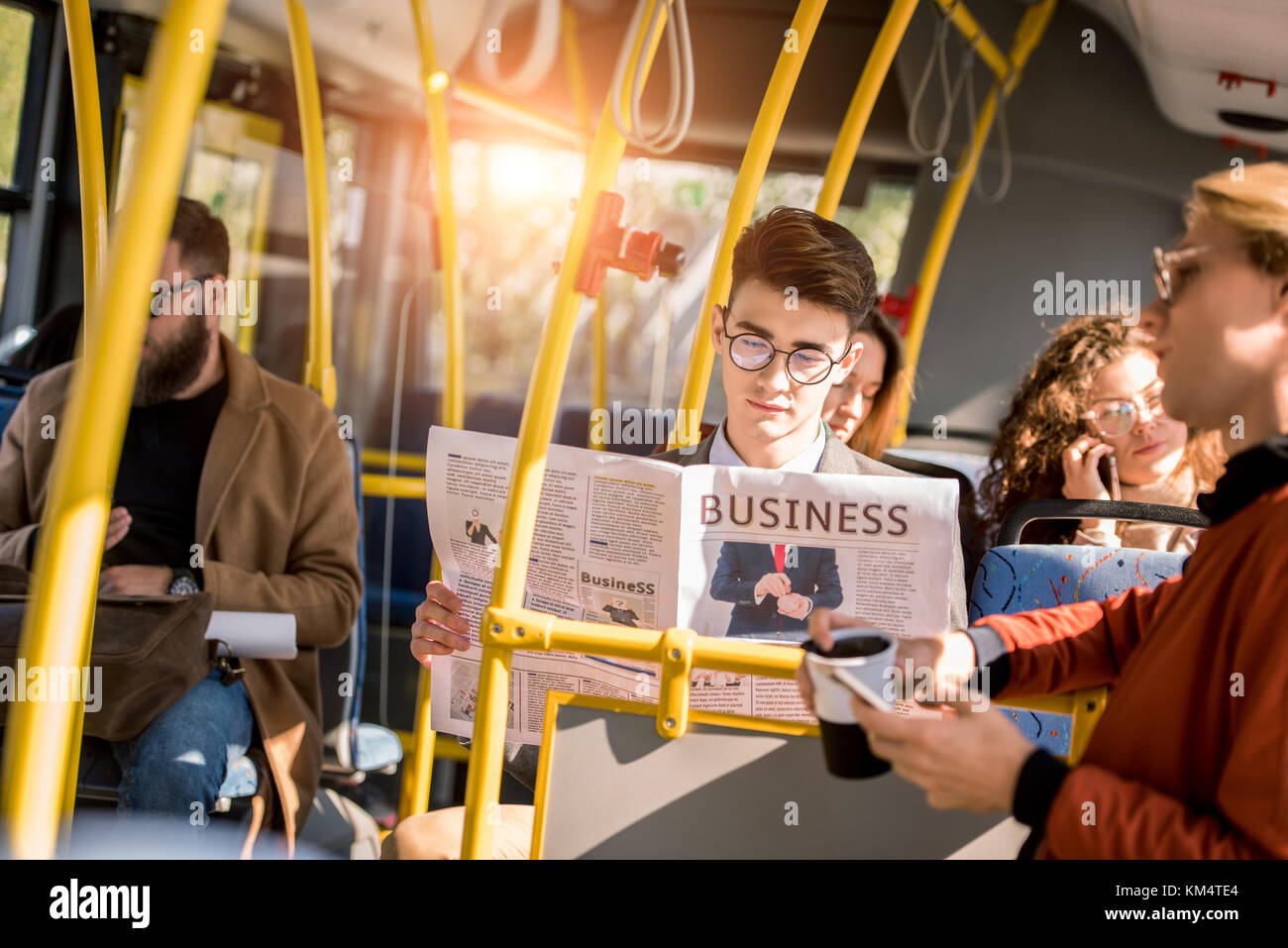 young businessman in bus Stock Photo - Alamy