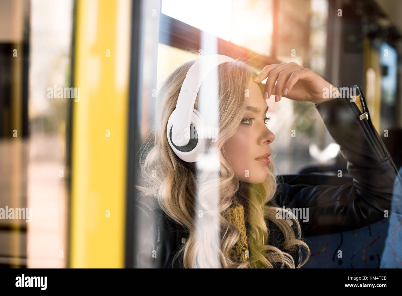 girl listening music in bus Stock Photo - Alamy
