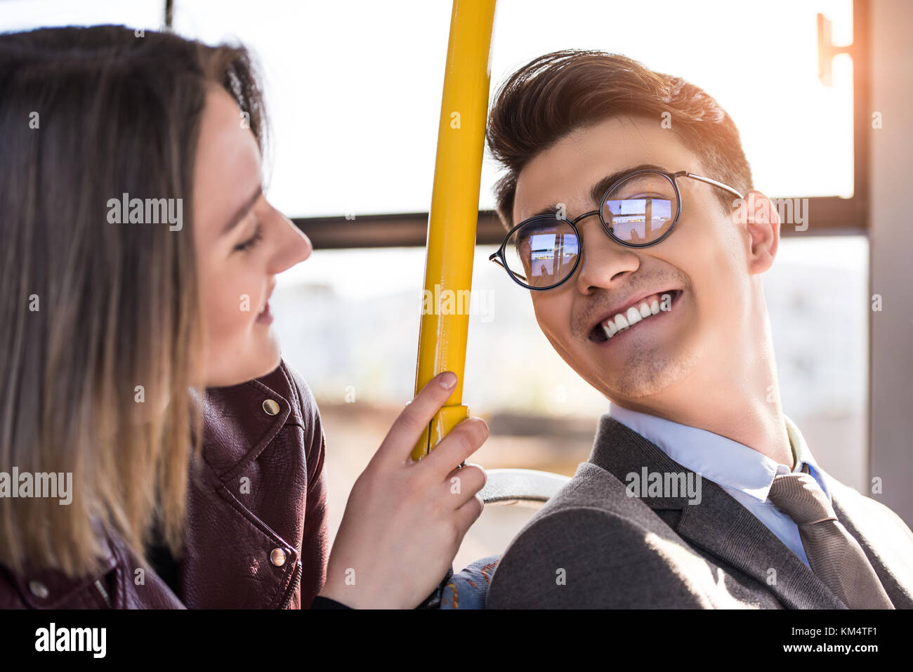 smiling couple in bus Stock Photo - Alamy