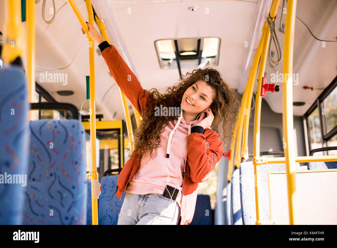 happy girl in bus Stock Photo - Alamy