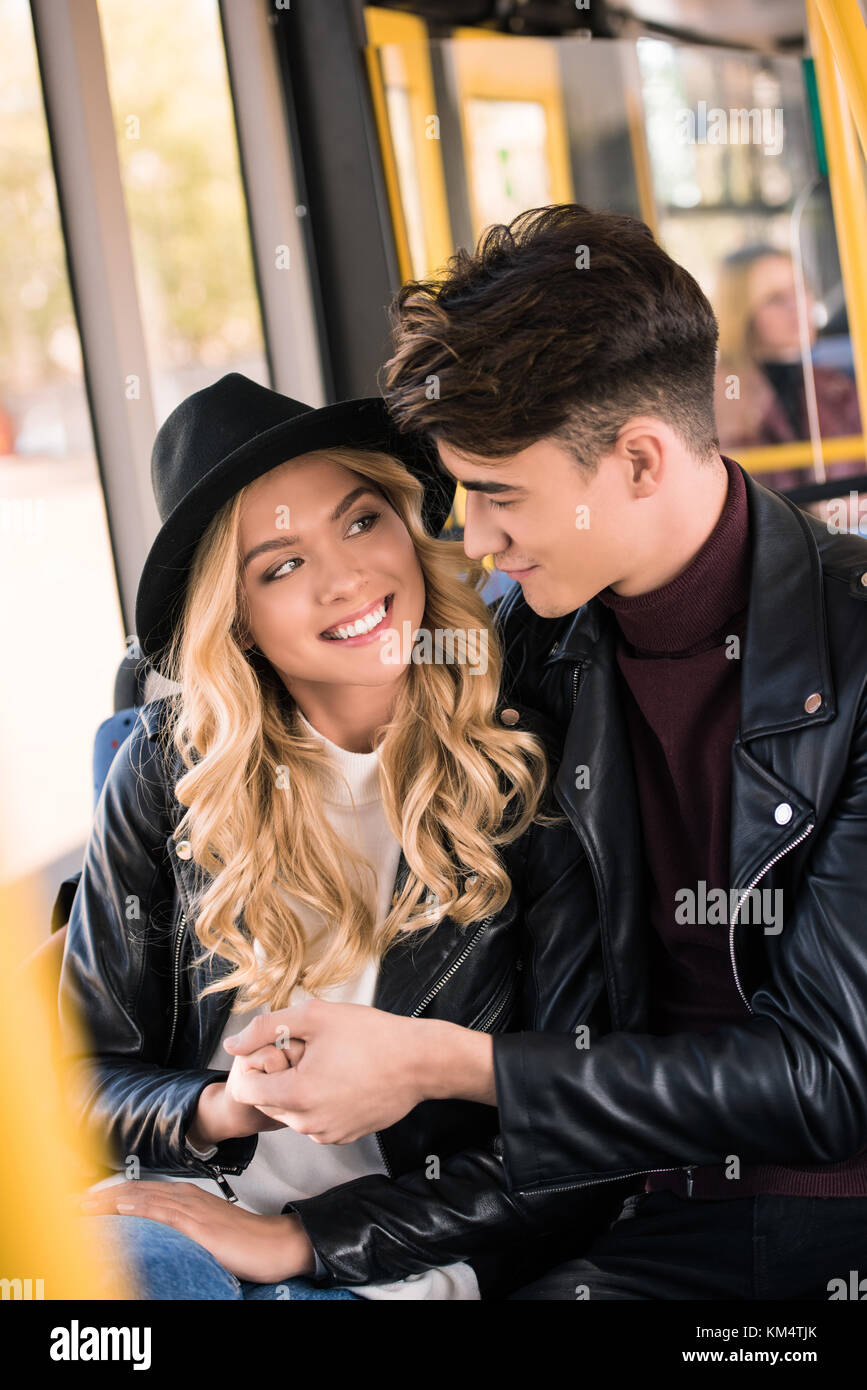 happy young couple in bus Stock Photo - Alamy