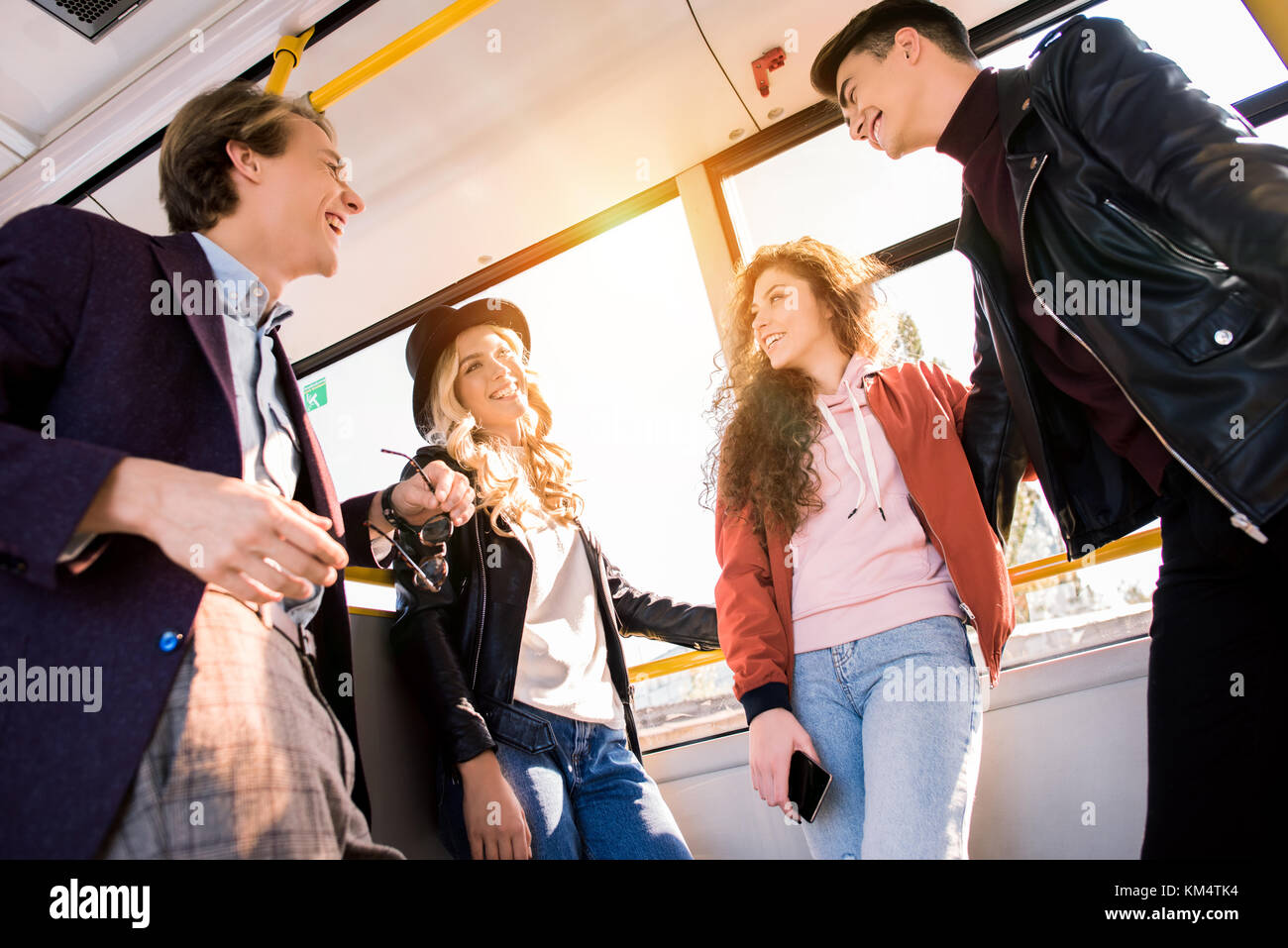 young friends in bus Stock Photo - Alamy