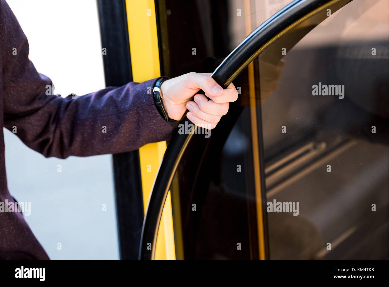 young man entering bus Stock Photo - Alamy