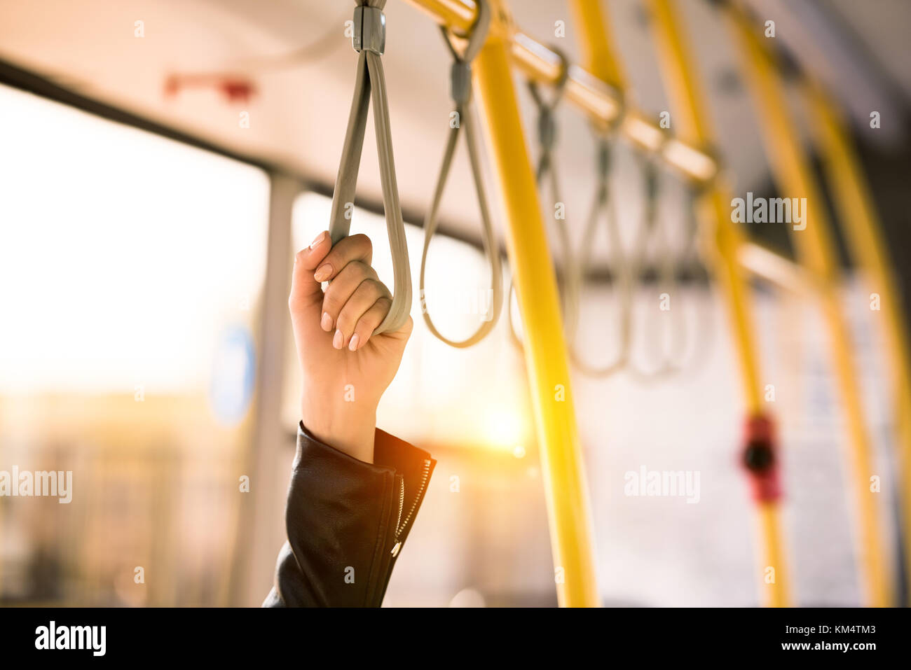 person standing in bus Stock Photo - Alamy