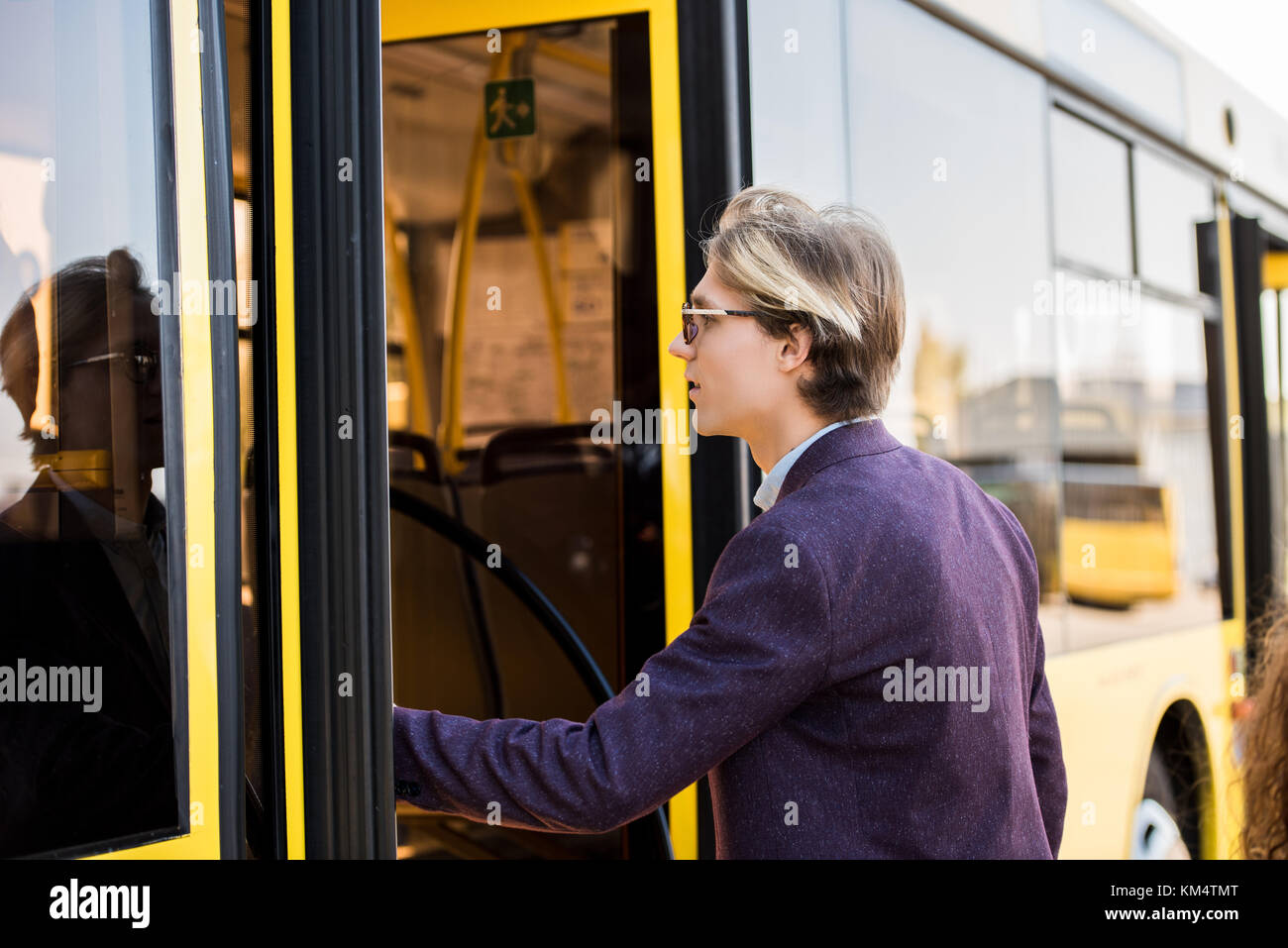 People entering bus hi-res stock photography and images - Alamy