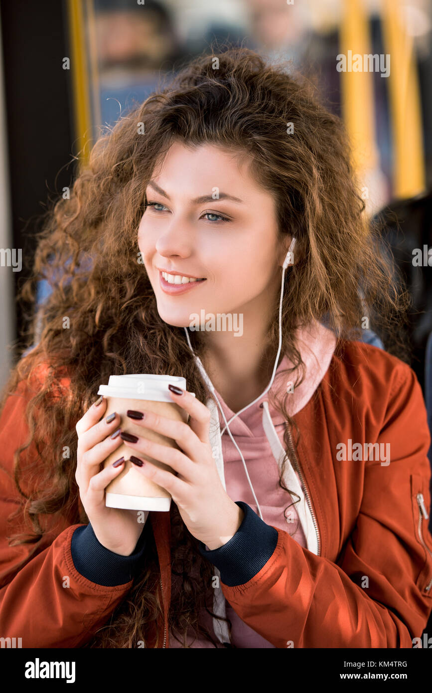 girl drinking coffee in bus Stock Photo - Alamy