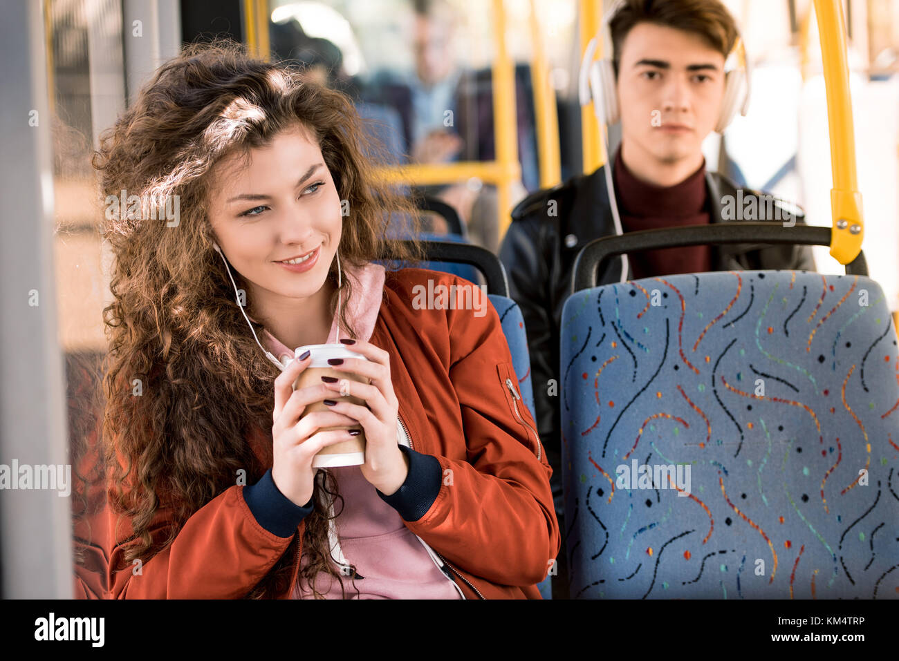 girl drinking coffee in bus Stock Photo - Alamy