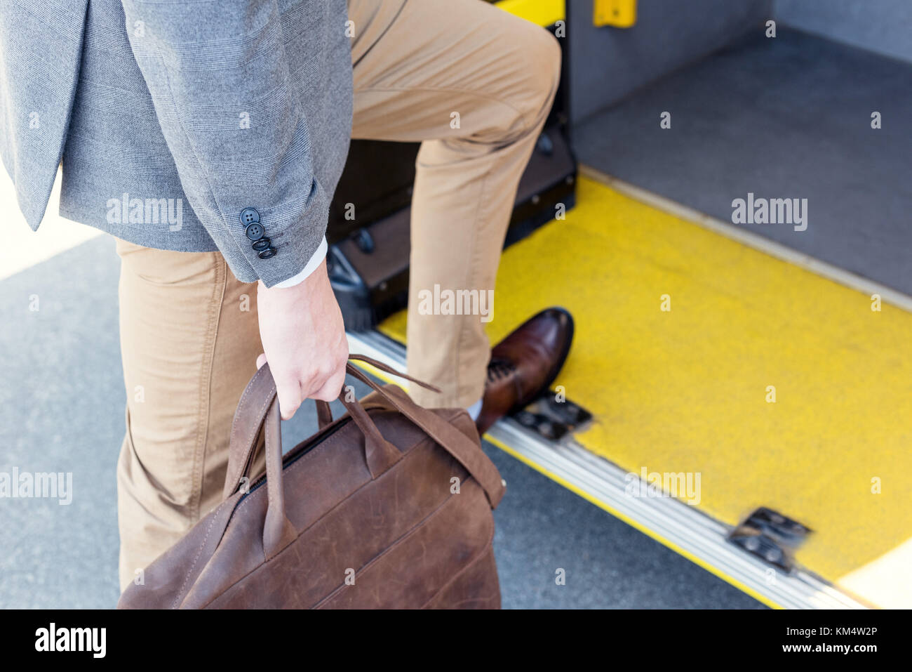 man entering city bus Stock Photo - Alamy