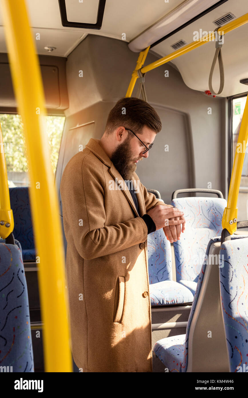 man checking time Stock Photo - Alamy