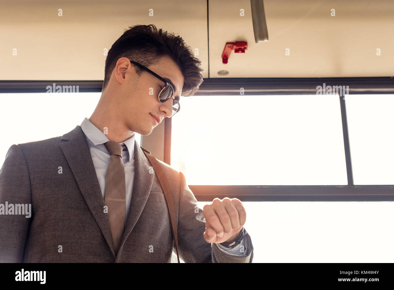 man checking time Stock Photo - Alamy