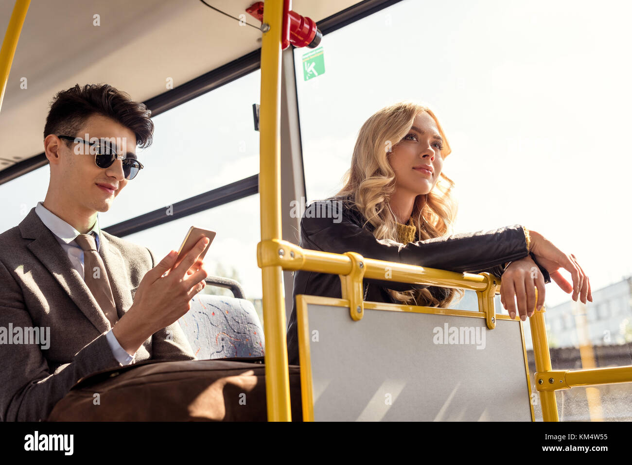 couple riding in city bus Stock Photo - Alamy