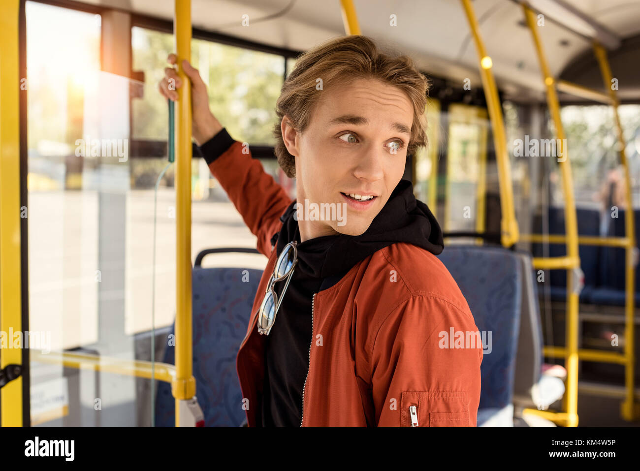 man riding in public transport Stock Photo - Alamy