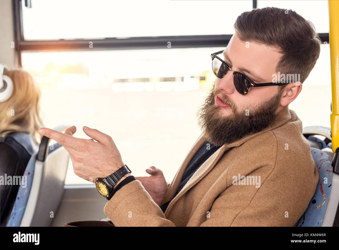 man riding in public transport Stock Photo - Alamy