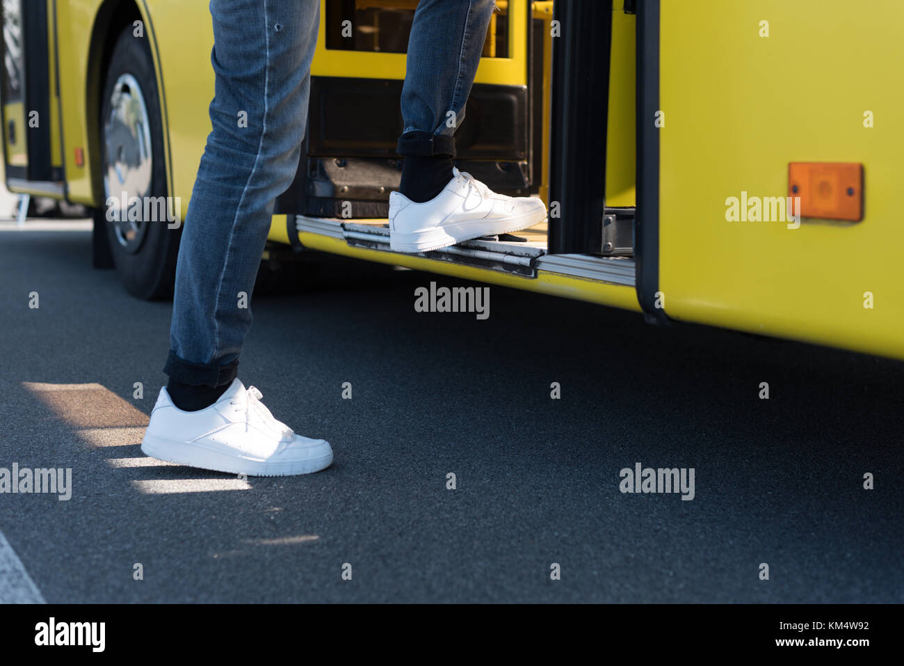 man entering city bus Stock Photo - Alamy
