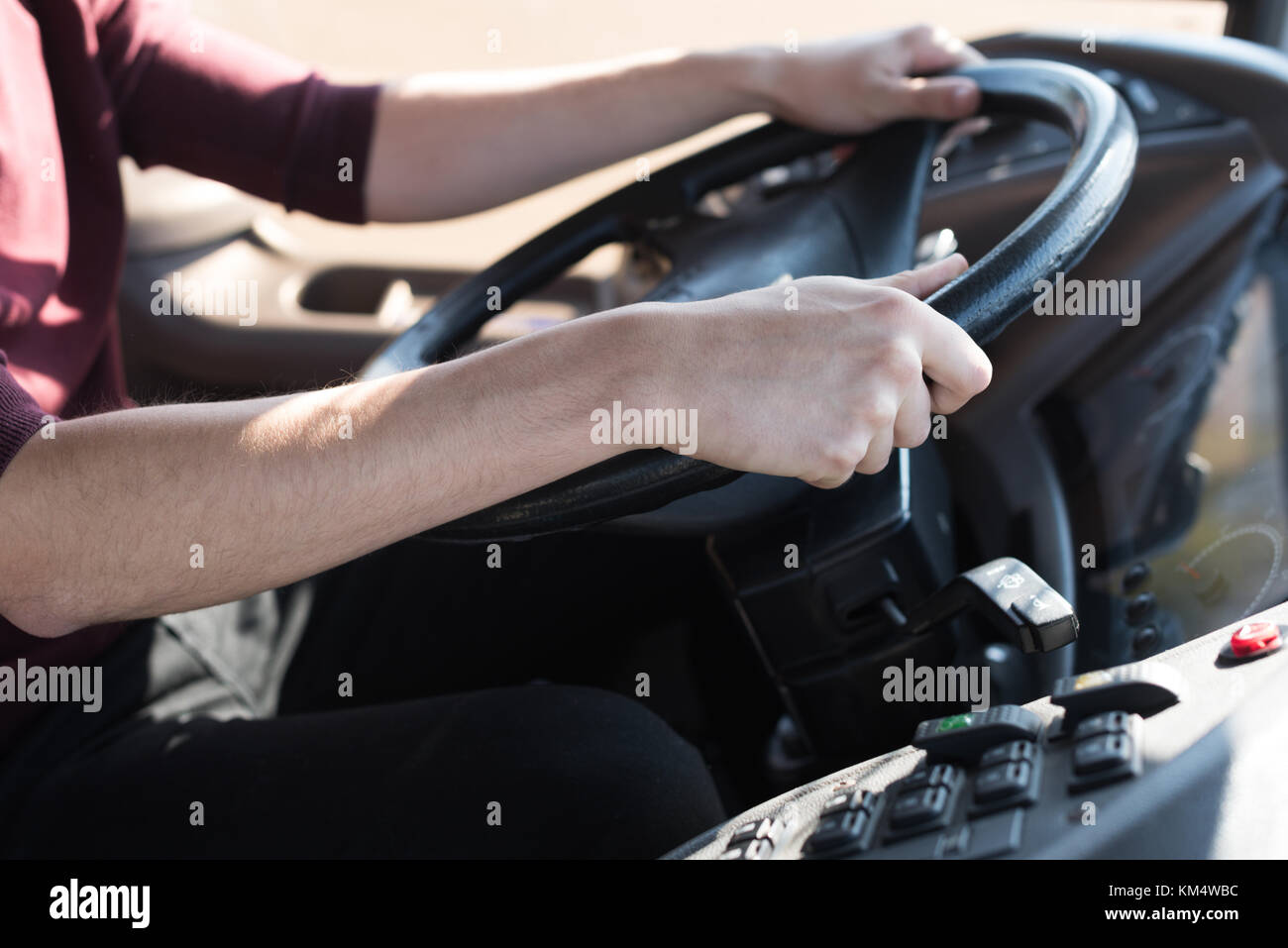 driver holding steering wheel Stock Photo - Alamy