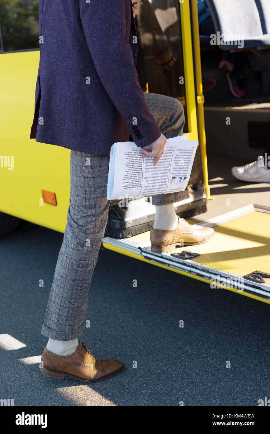 man entering city bus Stock Photo - Alamy