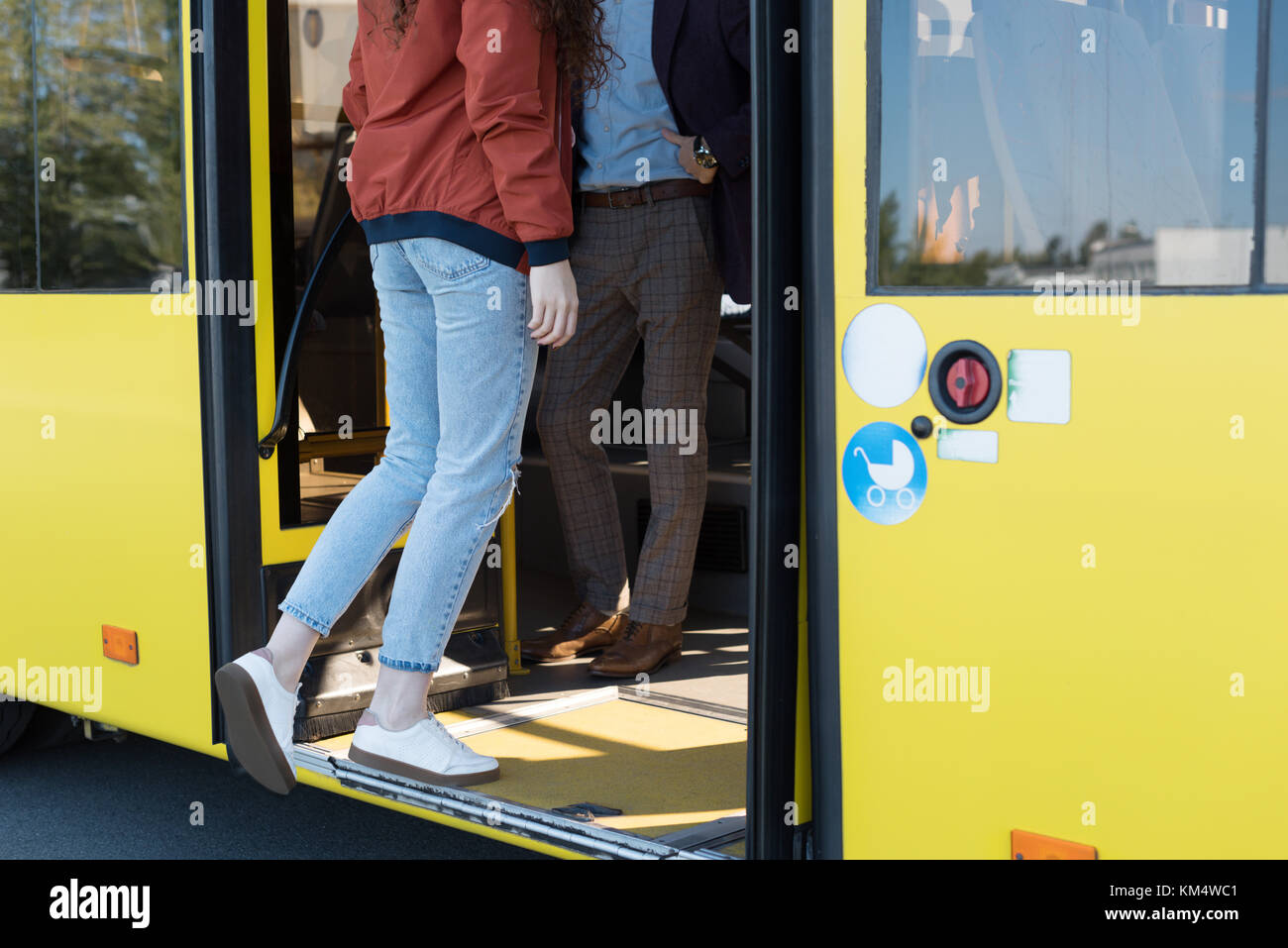 woman entering bus Stock Photo - Alamy