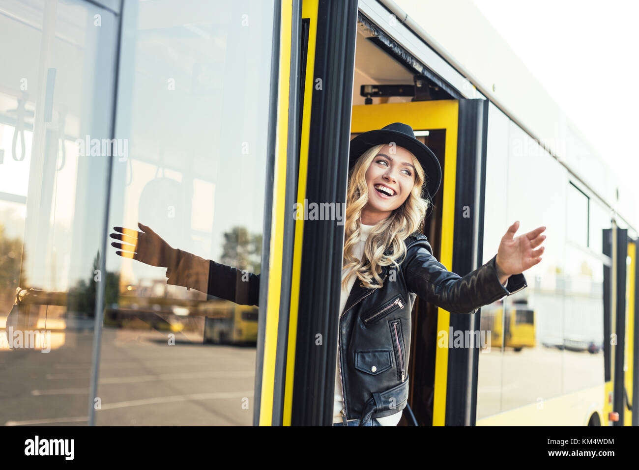cheerful woman in bus Stock Photo - Alamy