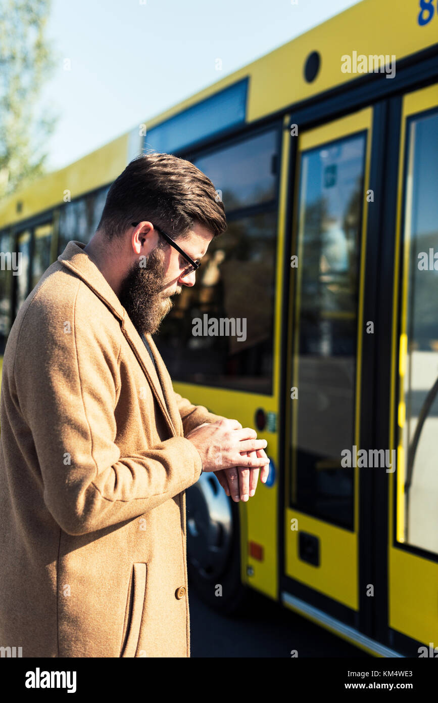 man checking time Stock Photo - Alamy