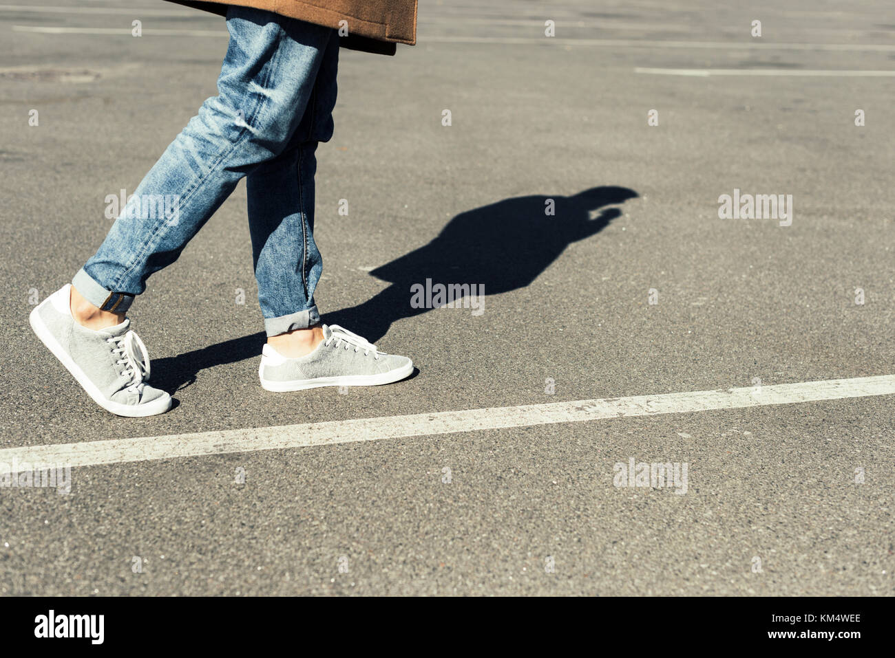 man walking on street Stock Photo - Alamy