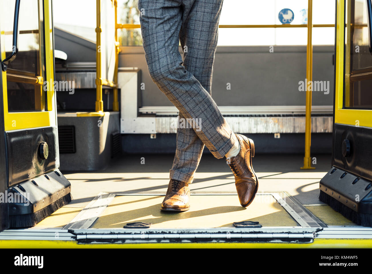 man standing in city bus Stock Photo - Alamy