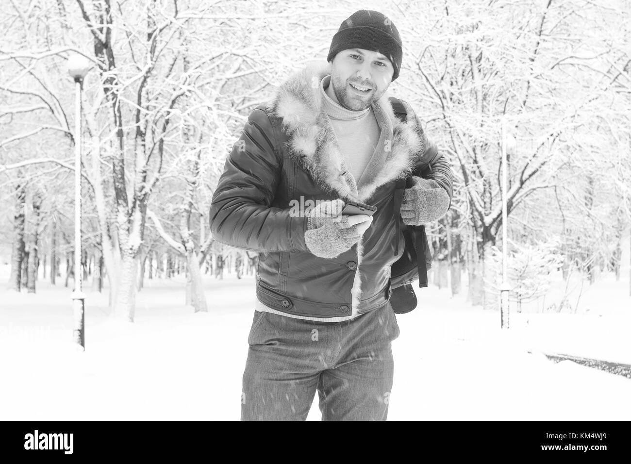 A man in winter clothes on the street Stock Photo - Alamy