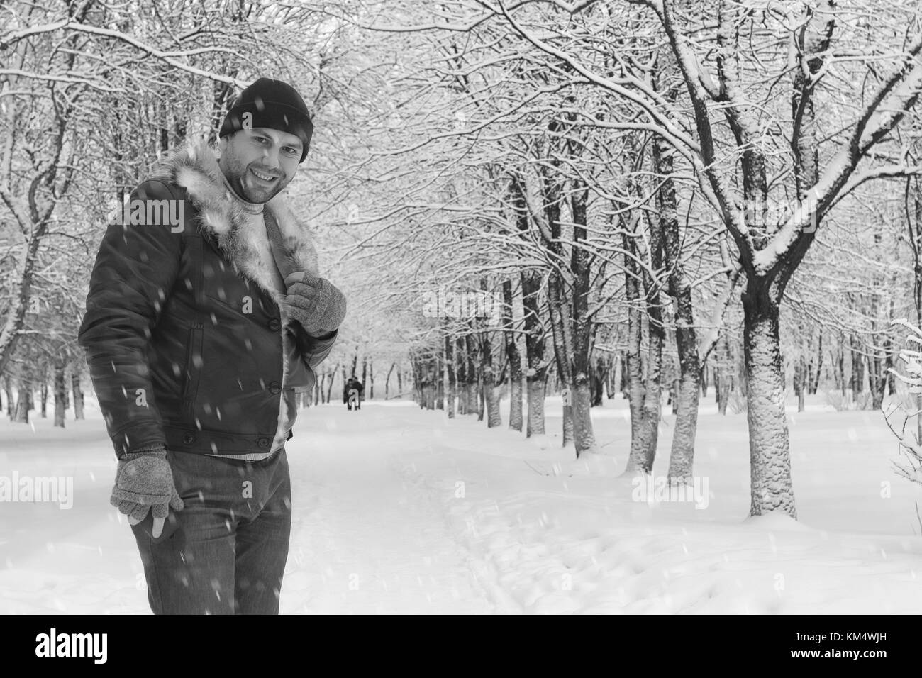 A man in winter clothes on the street Stock Photo - Alamy
