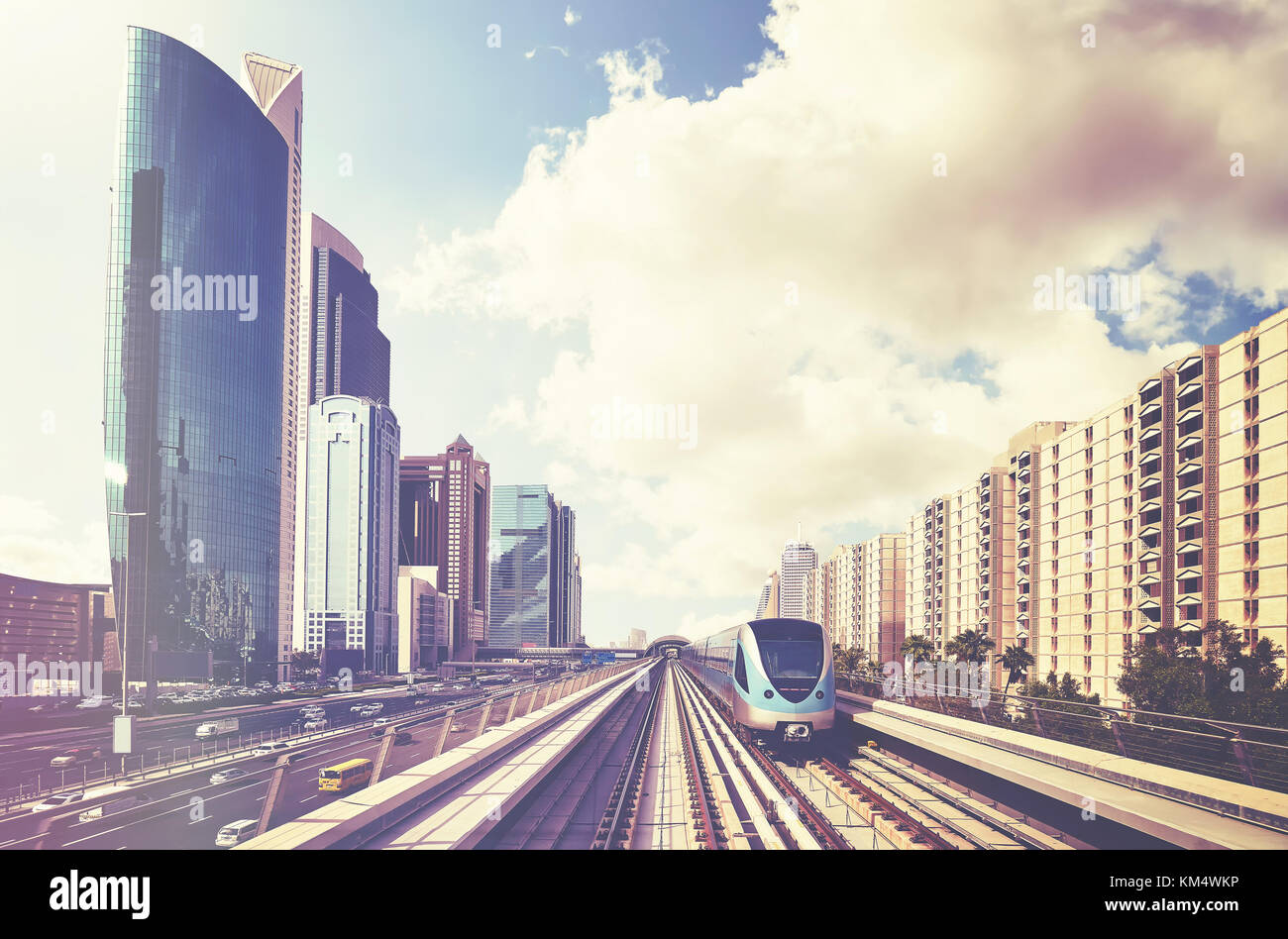 Metro train in Dubai downtown, retro stylized picture, United Arab ...