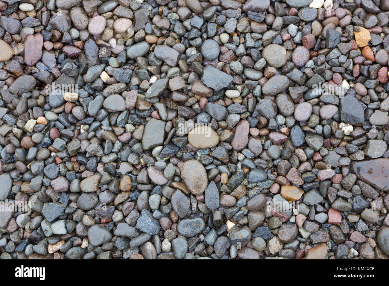 Wet pebble, rocks background Stock Photo - Alamy