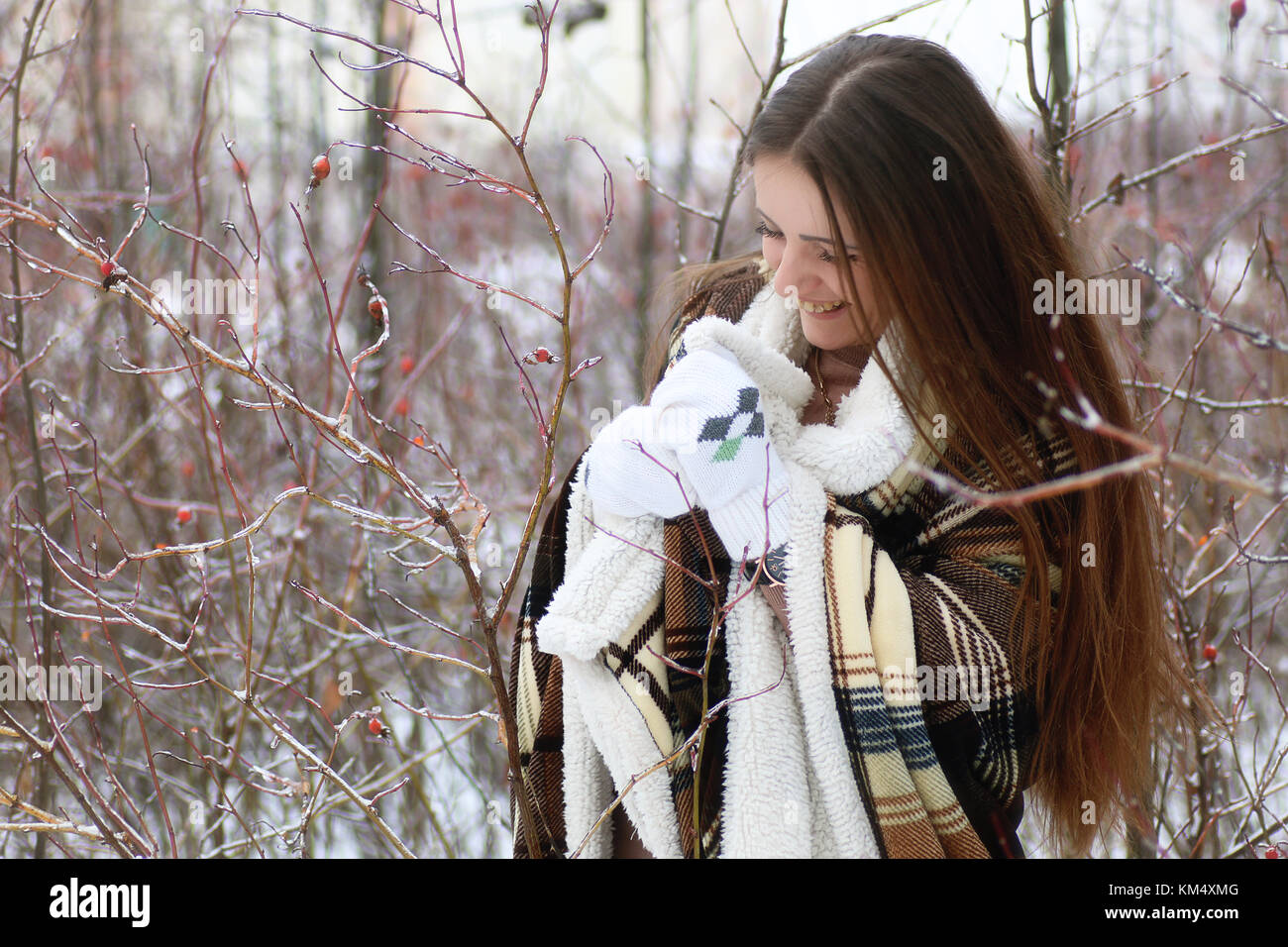 Young beautiful girl in winter snowy day Stock Photo - Alamy