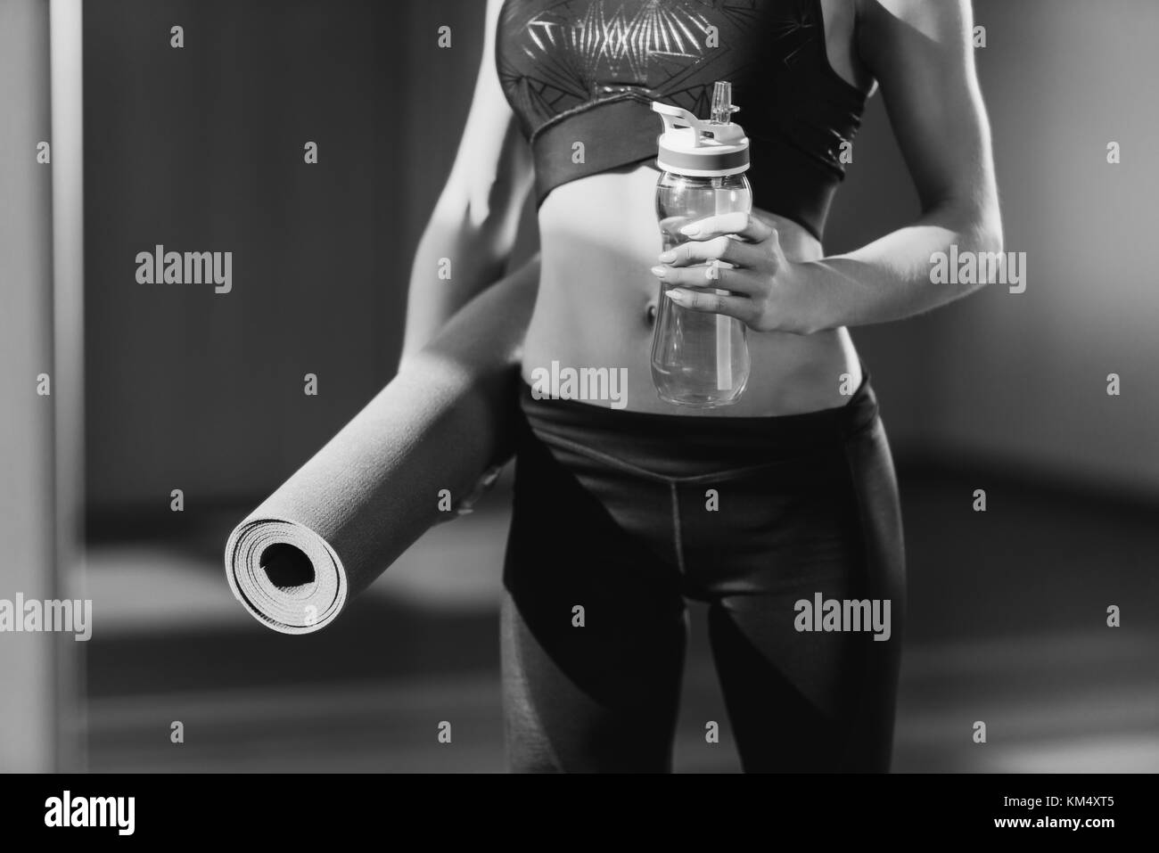 Rolled yoga mat Black and White Stock Photos & Images - Alamy
