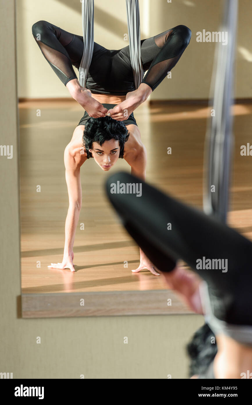woman practicing fly yoga Stock Photo - Alamy