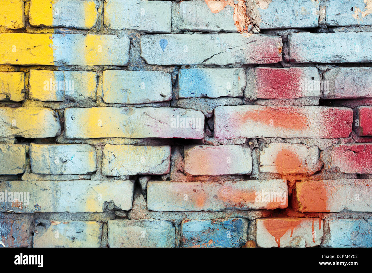 Colorful painted brick wall background Stock Photo - Alamy