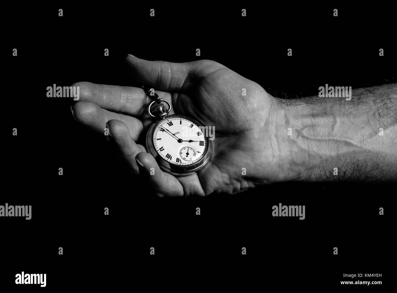 Black & white close up of isolated male hand holding gentleman's old ...