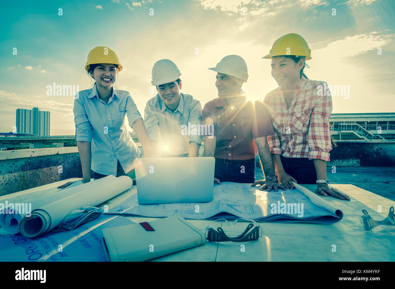 Team engineers working sunset building hi-res stock photography and ...