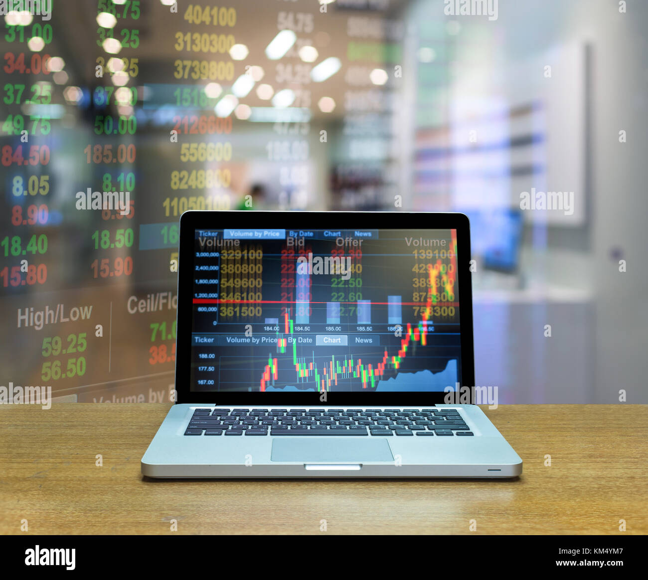 Stock exchange market trading graph over the screen of computer laptop ...