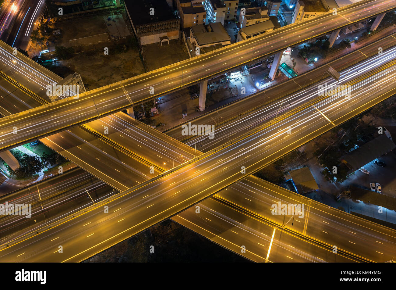 Top view of massive expressway at night with light of cars ...