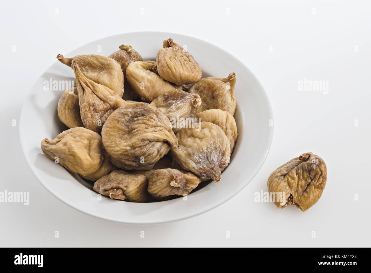 figs round bowl white background Stock Photo - Alamy