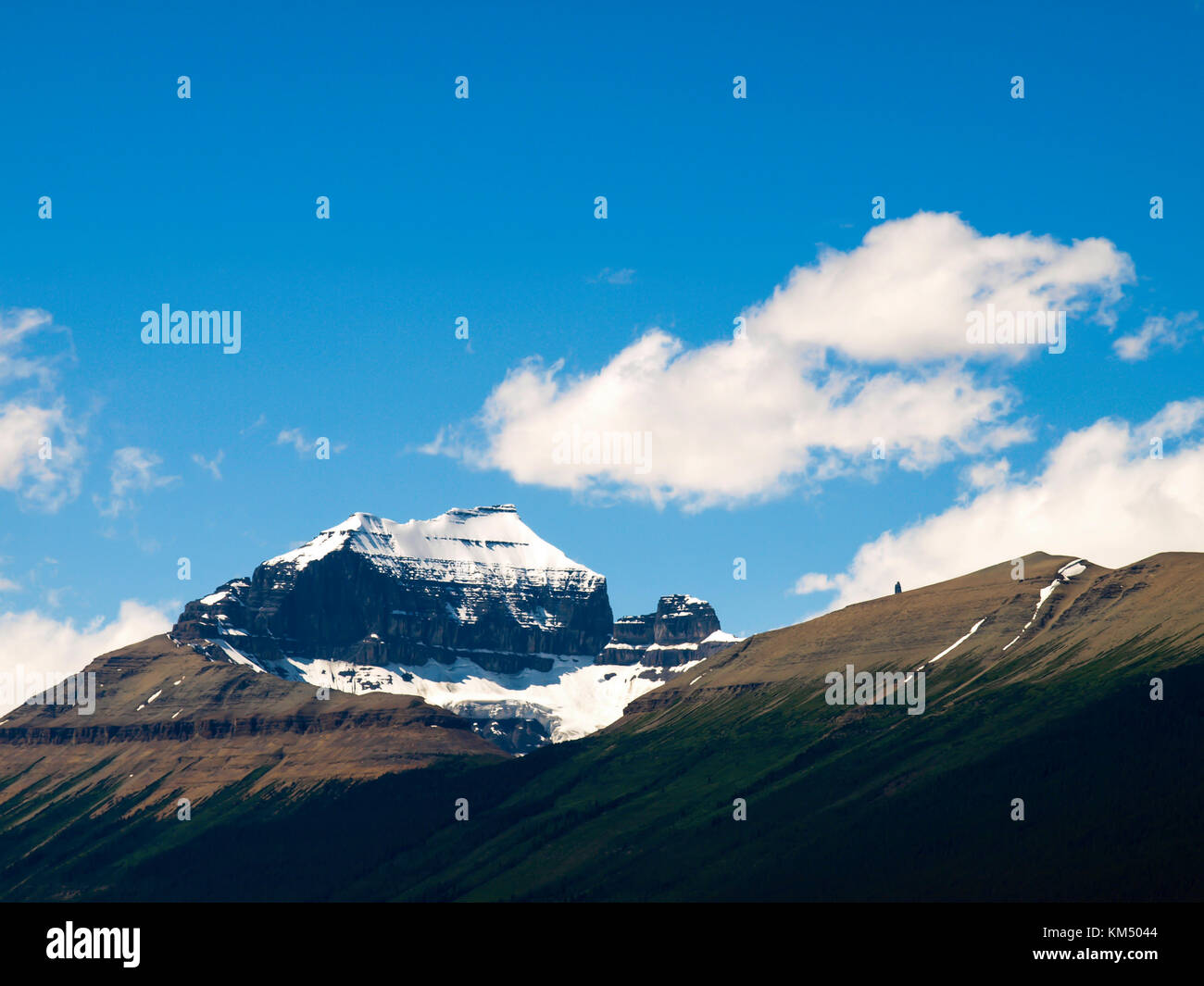Stunning bring mountain peak showing details of snowy glacier on peak ...