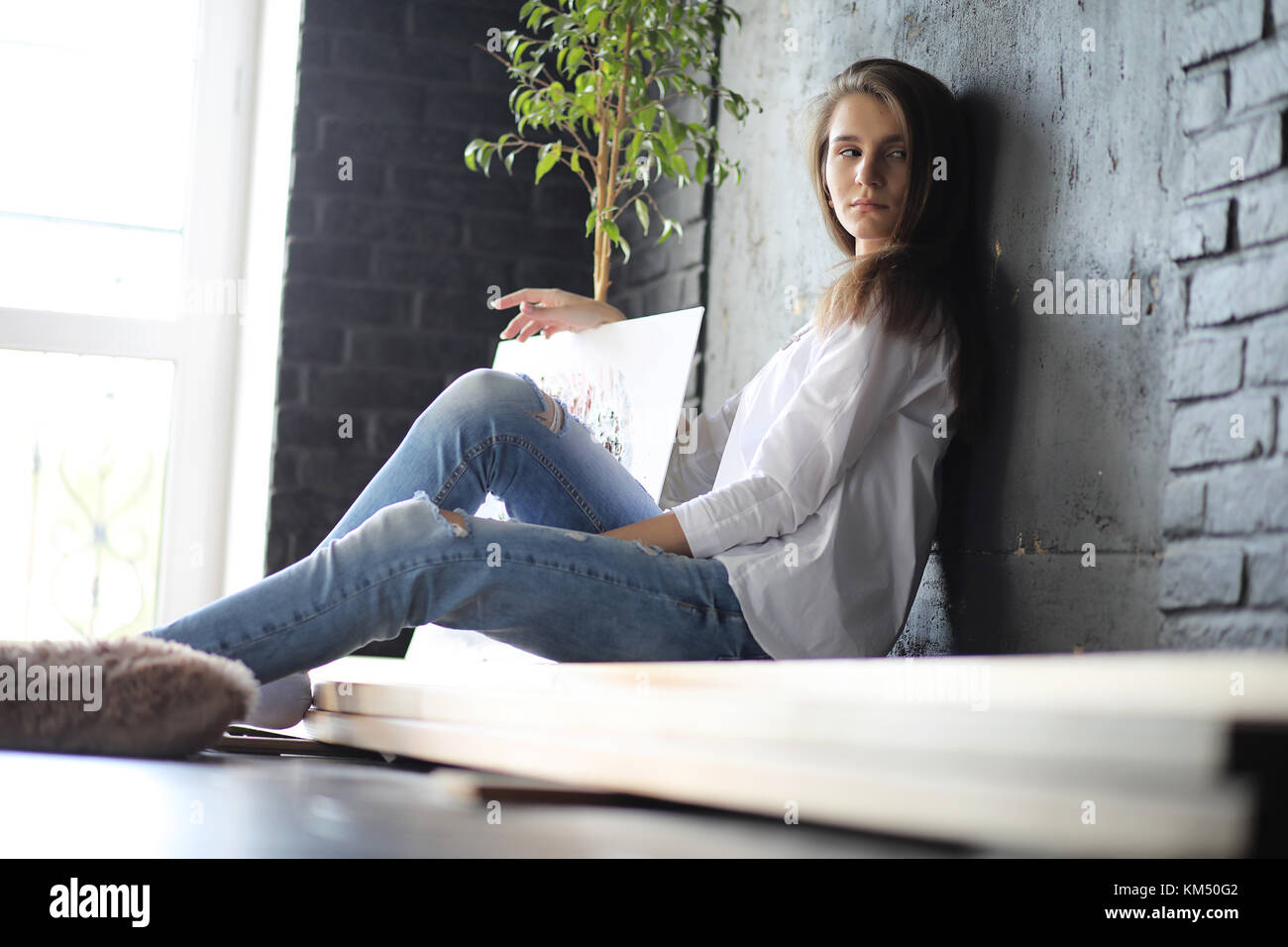 Beautiful girl artist at work Stock Photo - Alamy