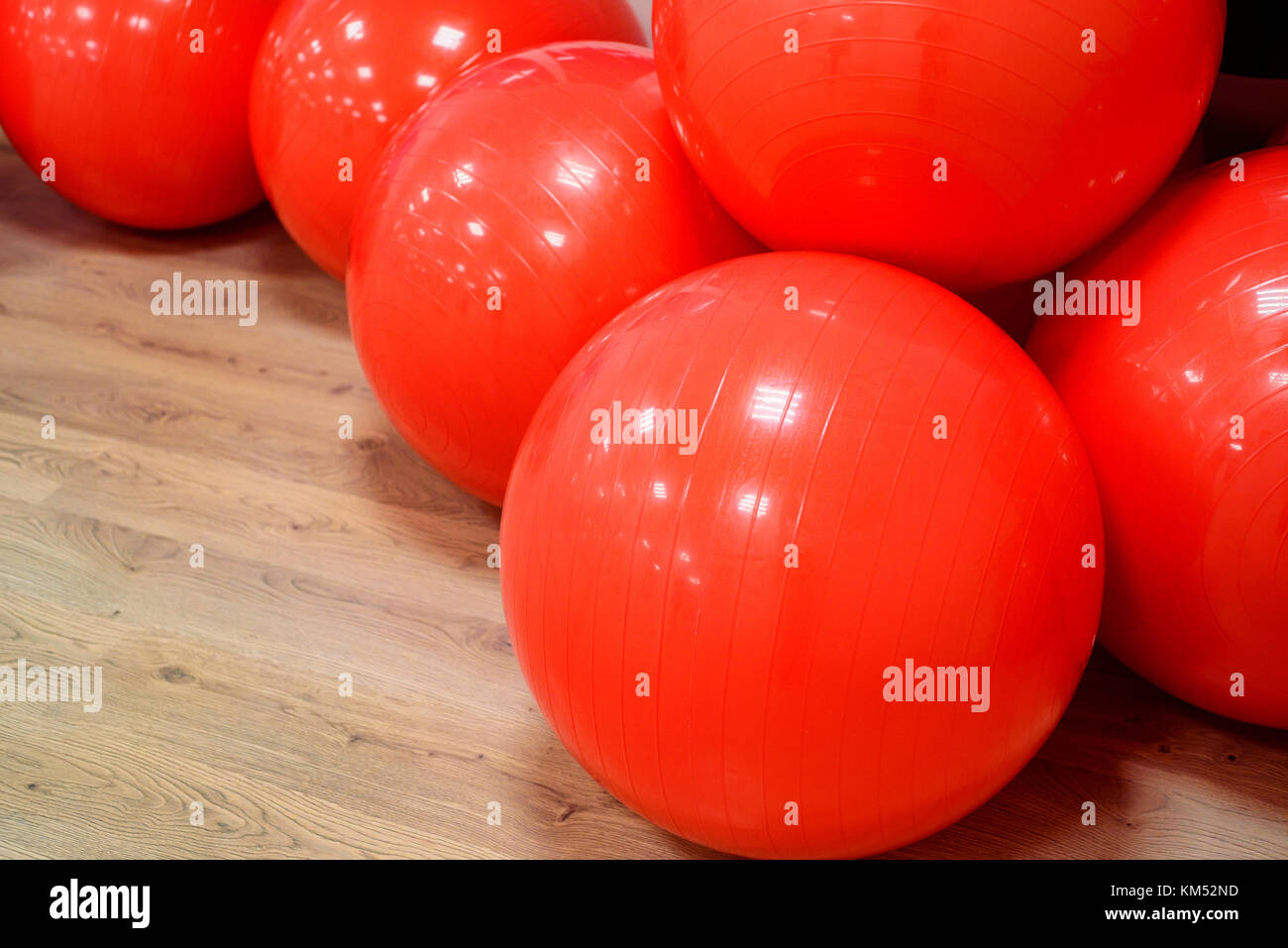 Close-up photo of red exercise ball Stock Photo - Alamy