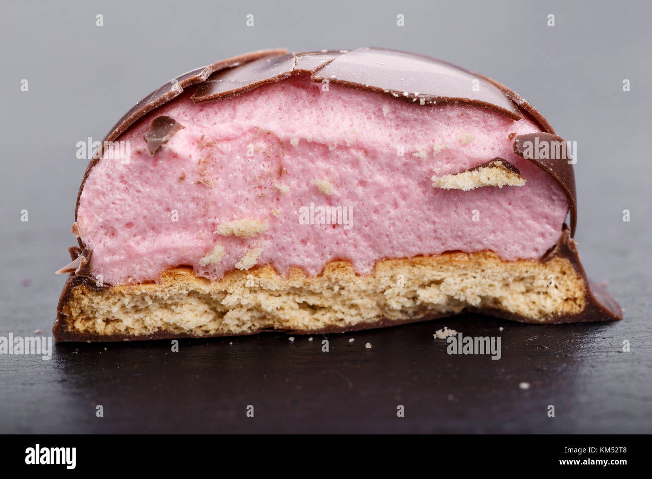 round chocolate candy on a black slate board Stock Photo - Alamy