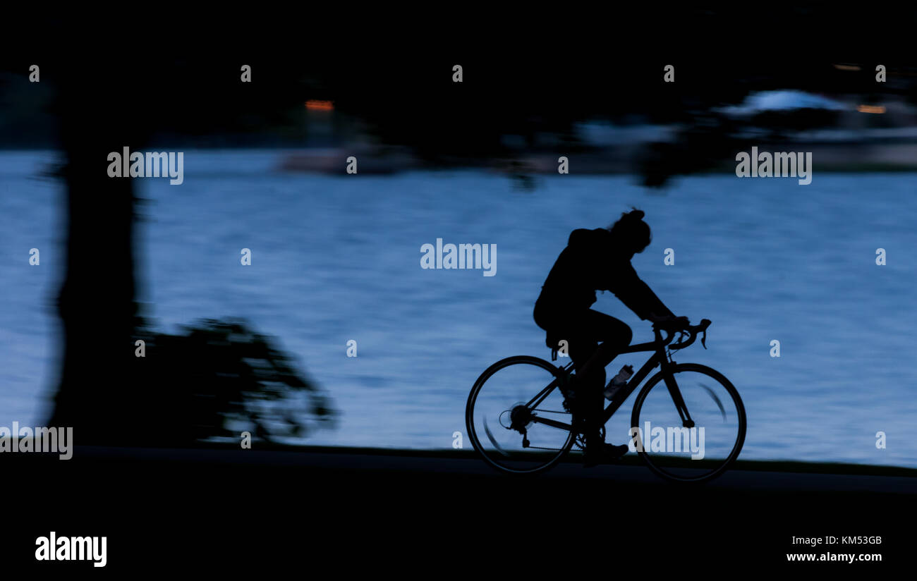 Families enjoy the sunset in Britannia Park along the Ottawa River in ...
