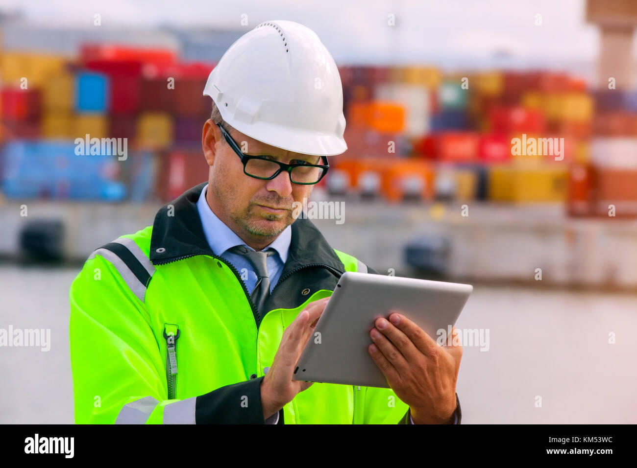 Construction engineer wearing safety vest Stock Photo - Alamy